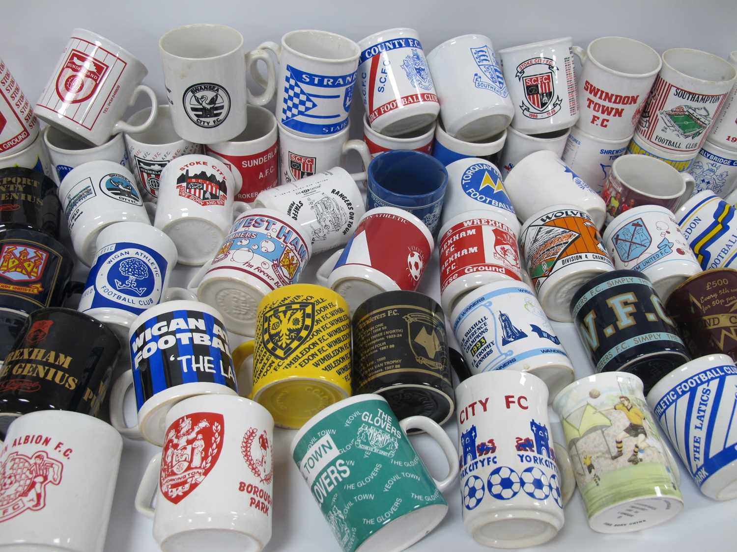 Lot 302 - Pottery Football Mugs, alphabetically sorted,